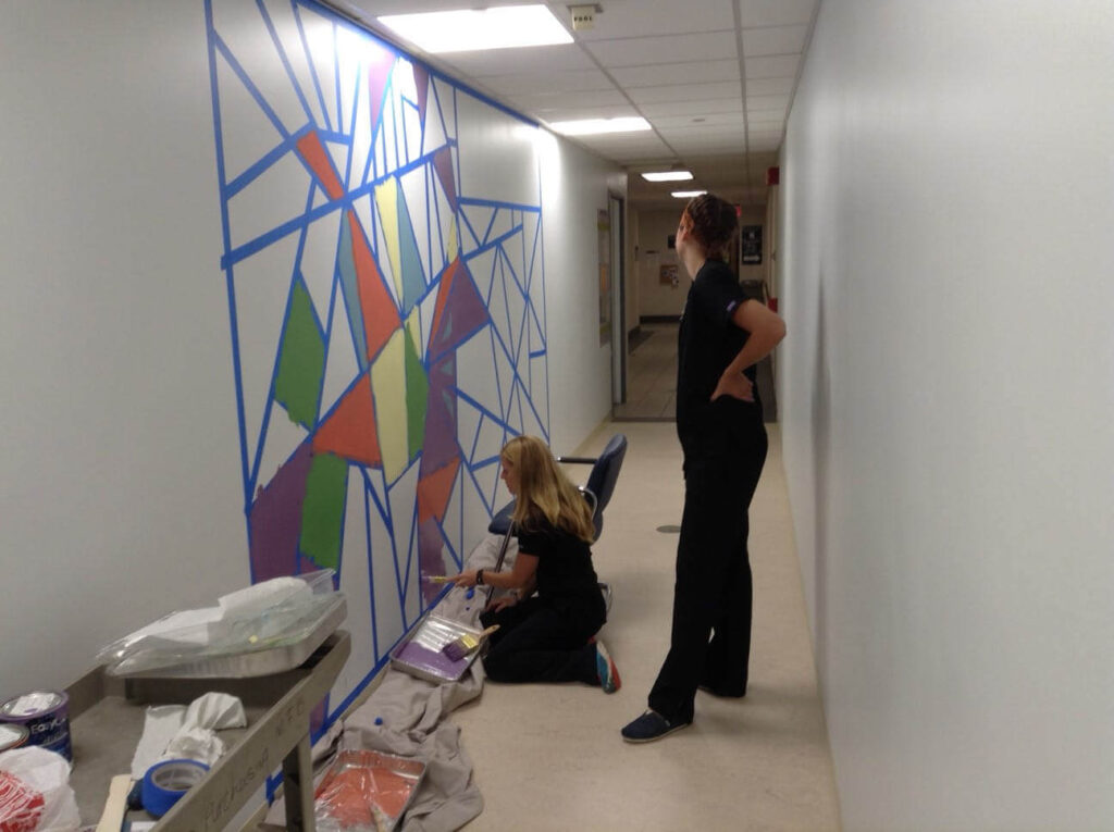 Patients create mural art as part of recreational therapy